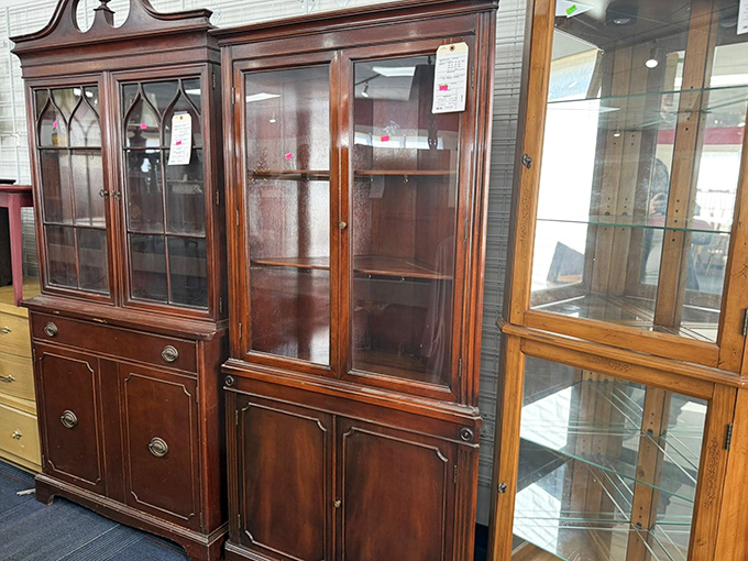 Stately wooden cabinets with stories to tell. These vintage display cases could showcase your treasures while becoming conversation pieces themselves.