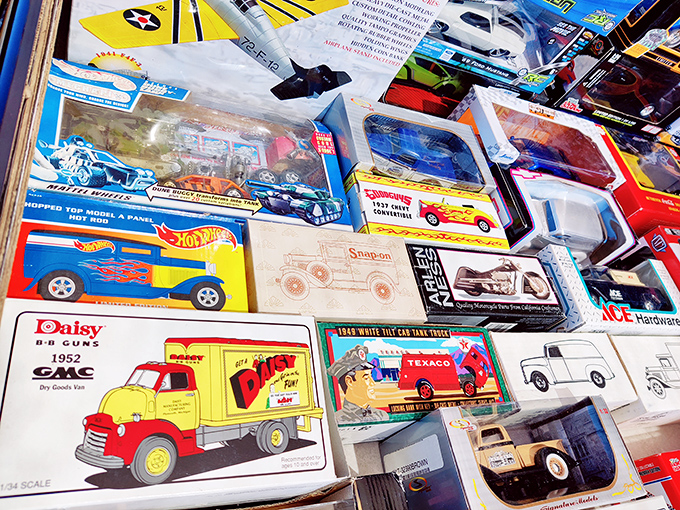 Miniature automotive history lessons line this table, where vintage toy trucks spark nostalgia in collectors young and old.