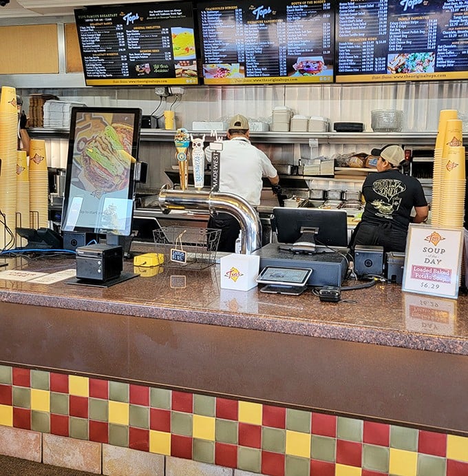 Where orders are called and burger dreams are fulfilled. That counter has witnessed more food joy than most five-star restaurants.