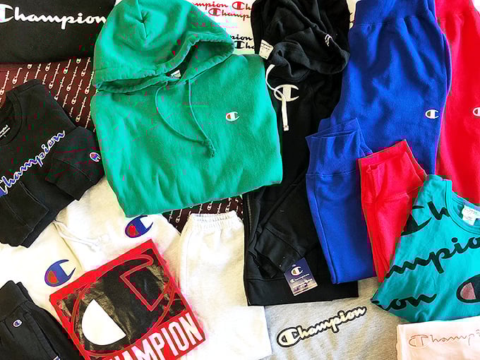 Champion's iconic "C" logo multiplied across this display creates a varsity team of affordable athleisure options for budget-conscious shoppers.
