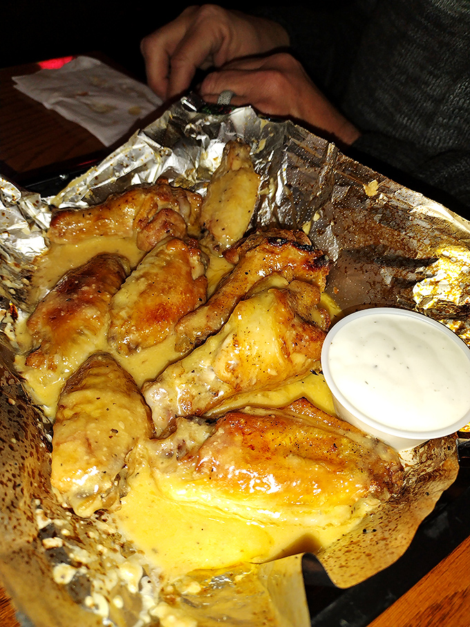 These wings aren't playing around &ndash; golden, glistening, and ready to challenge your notion of what bar food can be.