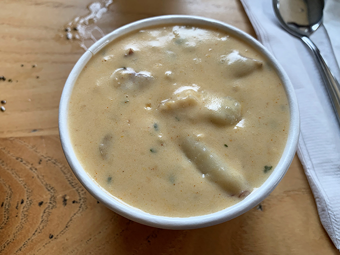 This isn't just chowder; it's a creamy ocean hug in a bowl, with tender clams that practically high-five your taste buds.