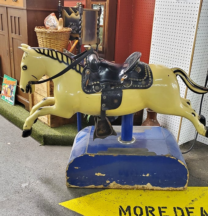 This vintage kiddie ride horse galloped through countless childhoods at five cents a trot. The worn saddle tells tales of tiny cowboys and their pocket-change adventures.