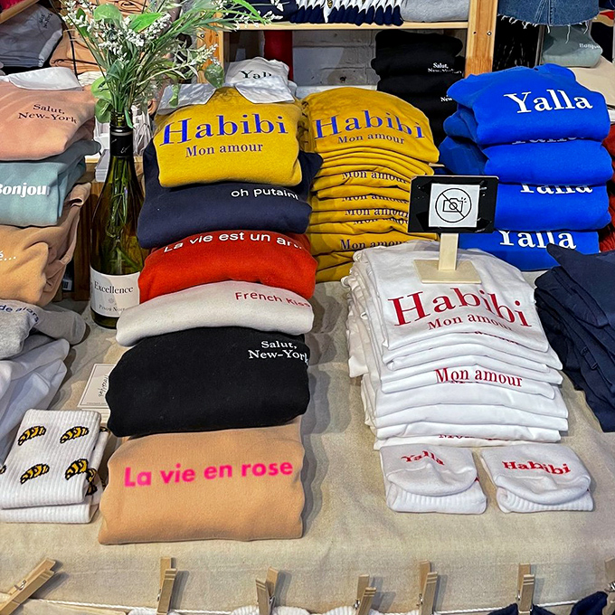 "Habibi" sweatshirts in sunshine yellow bring multilingual charm to New York wardrobes &ndash; fashion that speaks the universal language of style.