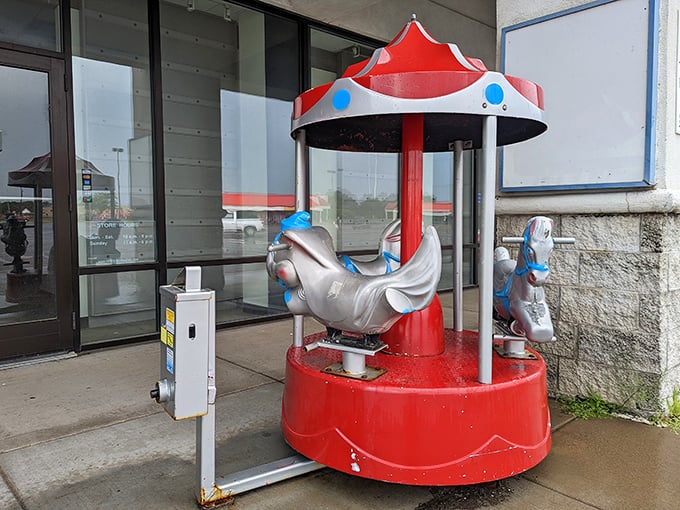 The nostalgic kiddie ride outside the entrance &ndash; where parents discover quarters still buy moments of childhood joy and precious seconds of shopping peace.
