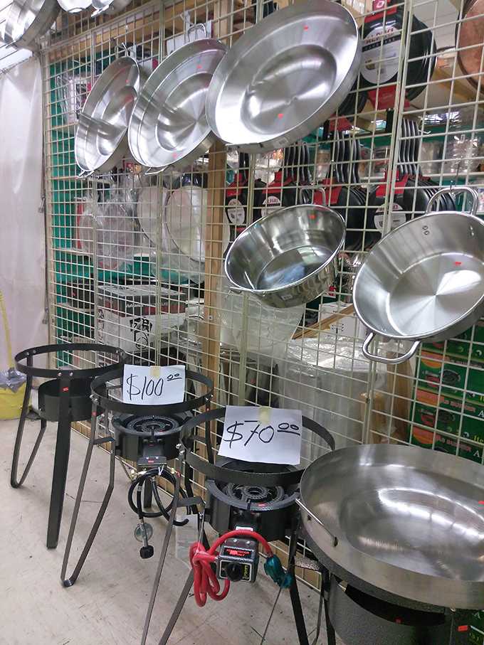 Cookware hanging like culinary medals of honor. These pots and pans await home chefs ready to channel their inner Gordon Ramsay without the screaming.