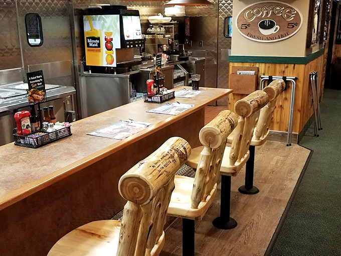 Those log cabin-style counter seats aren't just charming&mdash;they're front-row tickets to the breakfast show happening in the kitchen.