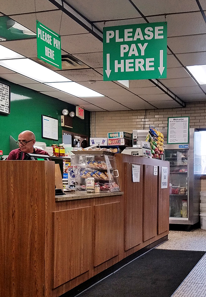 The "Please Pay Here" signs aren't just directions&mdash;they're your final step before re-entering the world as a happier, well-fed human.
