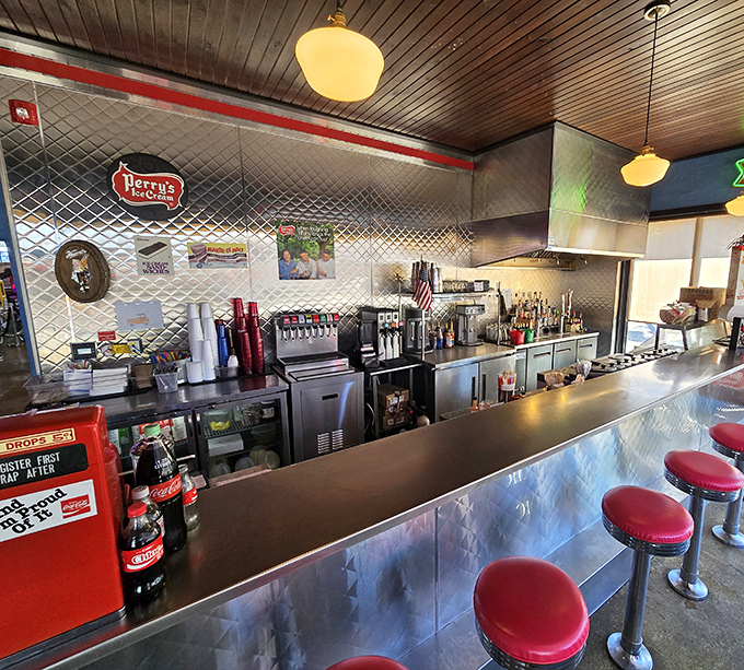 Counter seating with front-row views of the action, where coffee cups never stay empty for long.