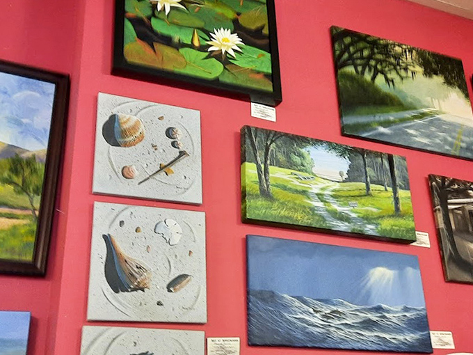 Local artwork adorns the vibrant walls, showcasing coastal scenes that remind you you're dining in paradise.