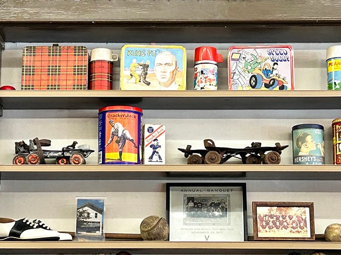 Vintage lunch boxes and memorabilia line the shelves like a curated museum of childhood happiness and nostalgia.