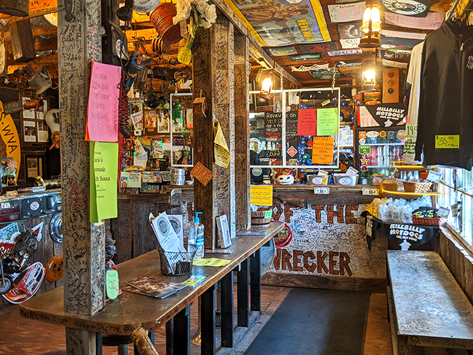 Where memorabilia meets menu: The Home Wrecker challenge awaits brave souls at the ordering counter. Food with a side of sensory overload.