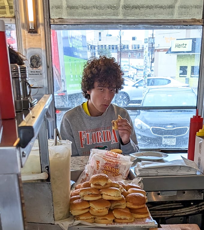 The window seat&mdash;where you can contemplate life's big questions while contemplating an even bigger appetite. Those stacked buns await their destiny.