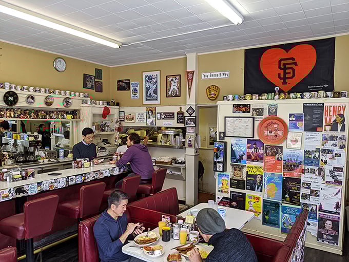 Where locals gather to fuel up before facing the San Francisco hills, surrounded by decades of neighborhood memorabilia and Giants pride.
