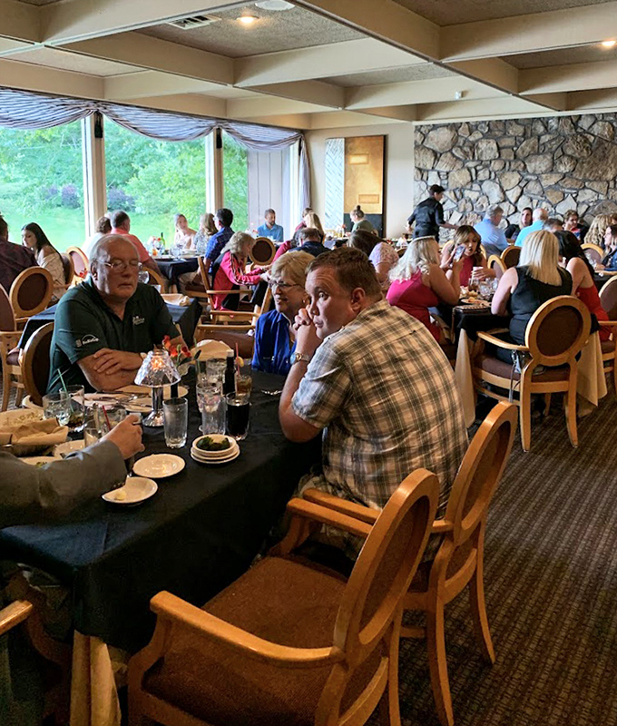 A bustling dining room where conversations flow as freely as the wine, proving that The Char isn't just about great food &ndash; it's about memorable gatherings. 