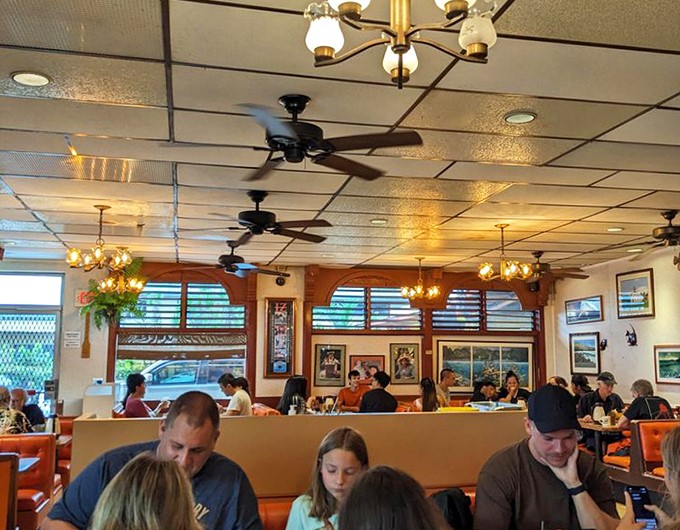 The dining room hums with the satisfied murmurs of locals and tourists alike, all united in the universal language of "mmm."