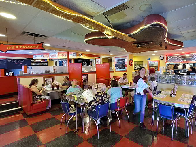 Where strangers become neighbors over coffee and pie. That guitar on the ceiling isn't decoration&mdash;it's a reminder that good food is music for the soul.