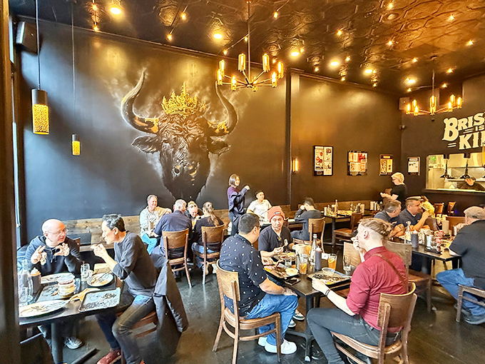 A dining room where strangers become friends, united by the universal language of "mmm" and "pass the napkins, please."