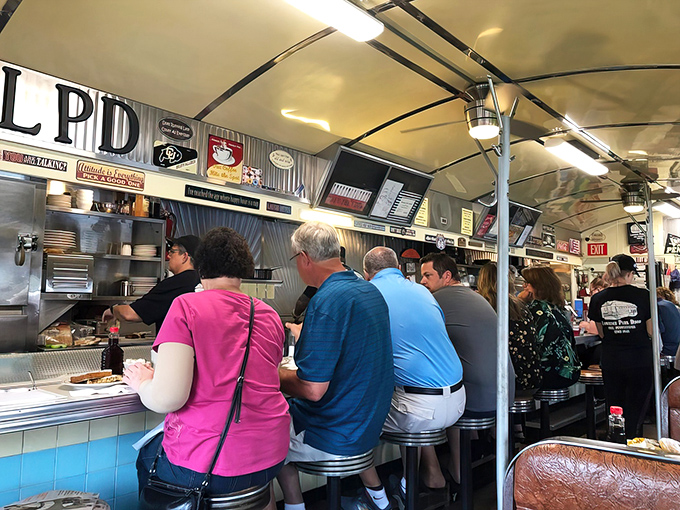The morning rush captured in amber light&mdash;this is what community looks like over eggs and coffee.