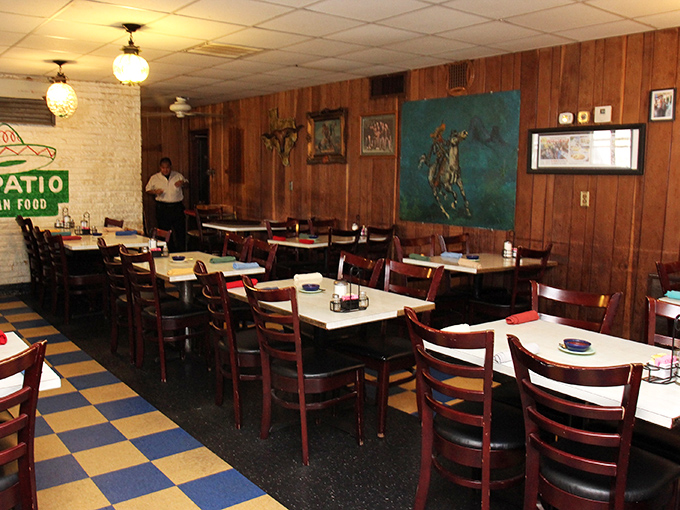 A dining room where every table has hosted first dates, family reunions, and "just because it's Tuesday" celebrations. Those wooden chairs have supported generations of happy eaters.