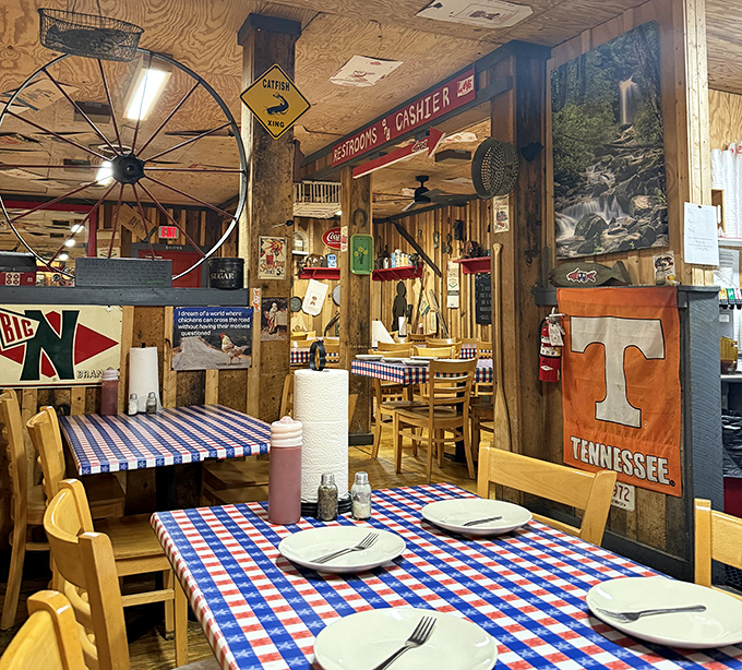 Red, white, and blue tablecloths under Tennessee memorabilia—because patriotism and good eating have always been comfortable companions in the South.