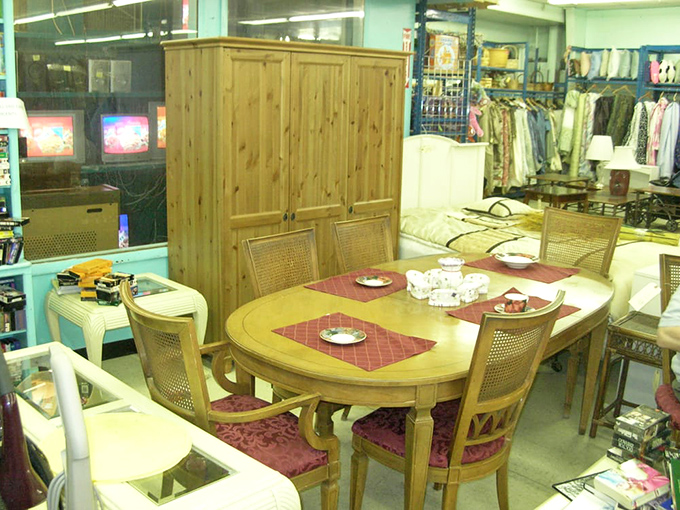 This dining set isn't just furniture; it's a time machine waiting to host your next family gathering with vintage charm.