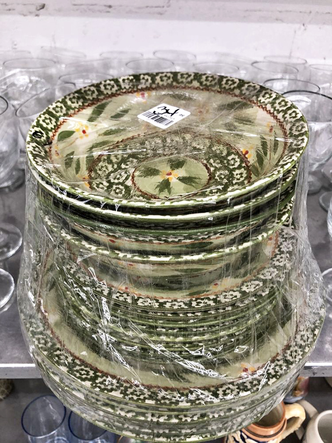 Vintage dinnerware stacked with care&mdash;each plate a circular time machine to grandma's Sunday dinners or retro dinner parties of decades past.