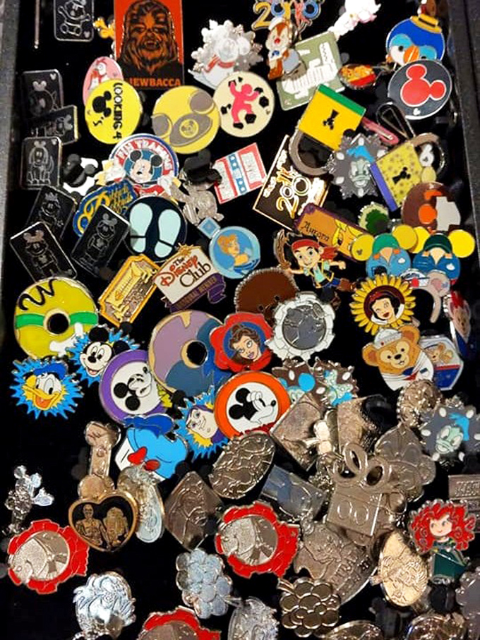 Disney pin collectors, take note! This treasure trove of character pins represents years of park visits and collector passion, now awaiting new homes.