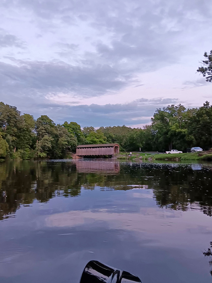Twilight reflections double the bridge's beauty. As day fades to dusk, the structure seems to float between water and sky like architectural magic.