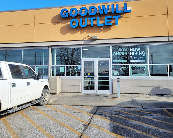 The gateway to bargain paradise, complete with "Now Hiring" sign – because sorting through America's cast-offs is surprisingly satisfying work.