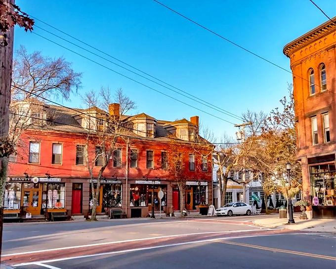 The golden hour transforms these brick buildings into something magical, like a movie set where everyone gets to be the main character.