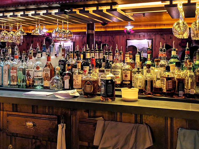 Behind the bar, bottles stand like a liquid library waiting to tell their stories in your glass.