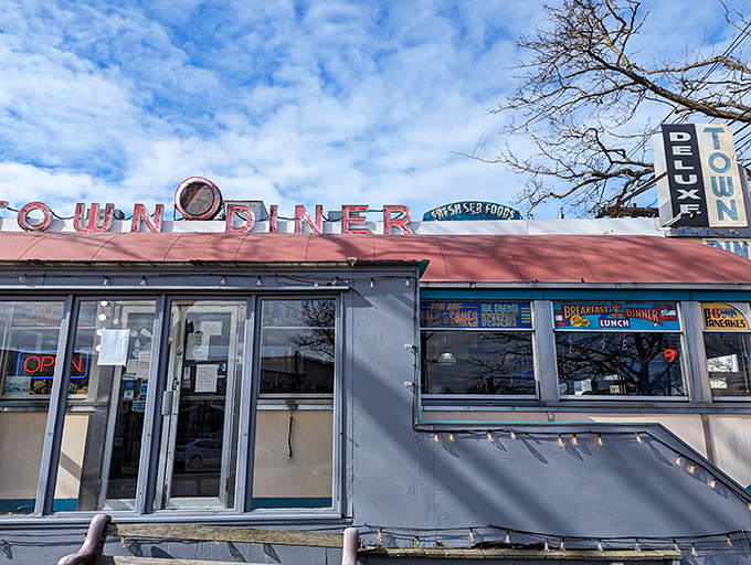 The entrance to breakfast paradise, where that neon "OPEN" sign might as well say "Yes, you absolutely deserve pancakes today."