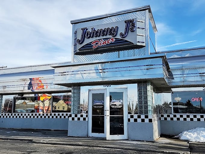 The entrance to Johnny J's promises more than just a meal—it's an invitation to step back in time while your stomach steps forward.