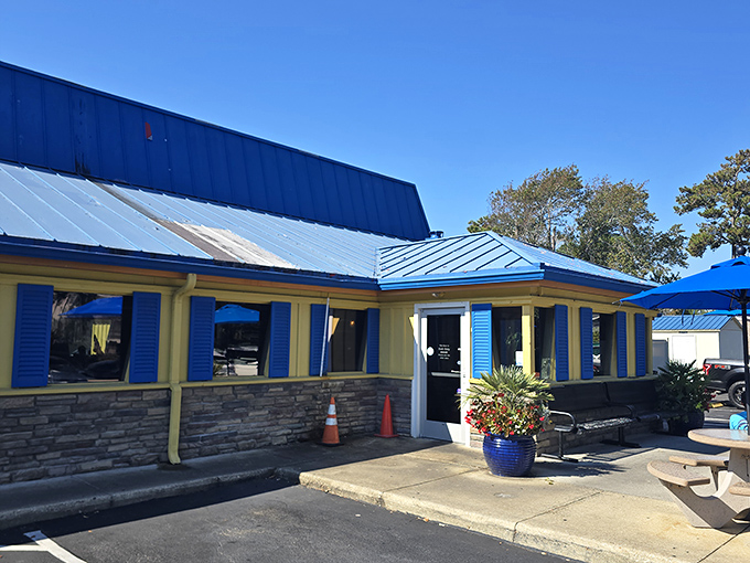 Blue shutters and stone accents create a beachy-casual vibe that says "come as you are" &ndash; hungry is the only dress code here.