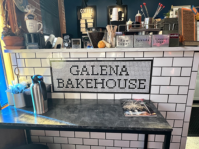 The coffee station's mosaic tile sign reminds you where you are, in case pastry euphoria made you temporarily forget.