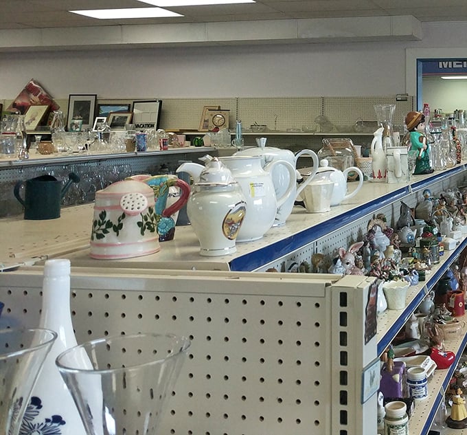 Teapots and trinkets line the shelves like an eccentric grandmother's china cabinet, each piece waiting for its perfect match.