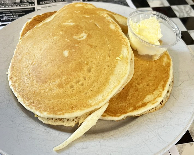 Pancakes this fluffy could double as pillows, though eating them is considerably more satisfying than sleeping on them.