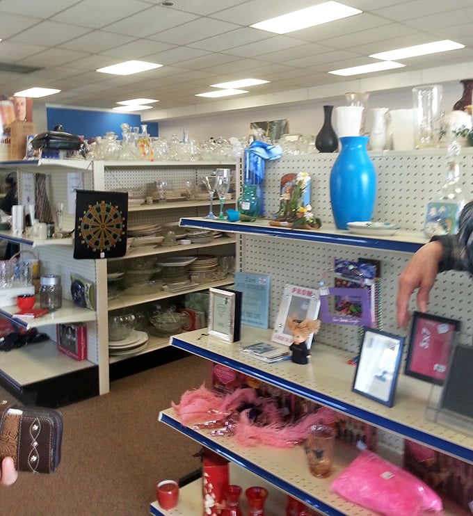 Blue vases and framed art proving that one person's "I'm redecorating" becomes another person's "That's exactly what I needed." 