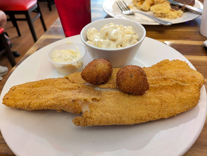 Golden-fried catfish with hushpuppies &ndash; a Southern duo that performs a perfect culinary duet on your taste buds.