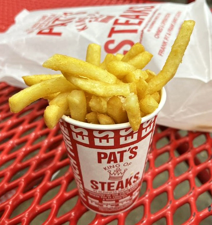 The fries at Pat's aren't just a side dish—they're the supporting actor who occasionally steals the scene from the headlining cheesesteak.