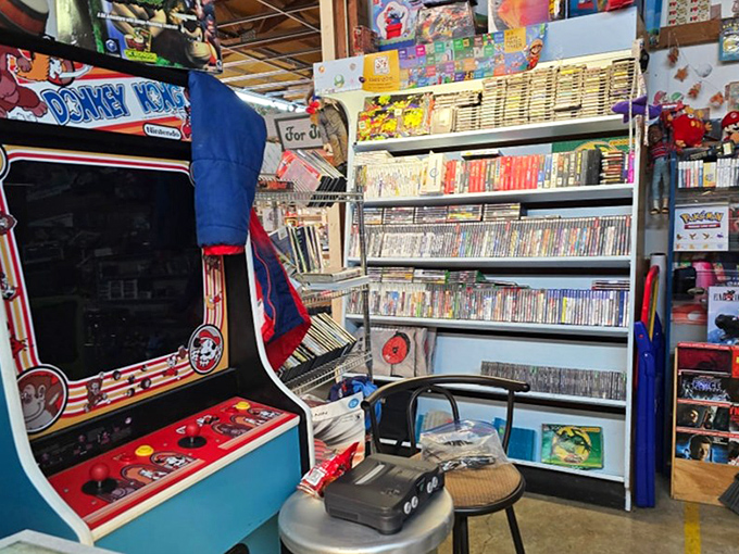 The arcade cabinet that launched a thousand quarters. Surrounded by vintage games that remind us when entertainment fit on a cartridge.
