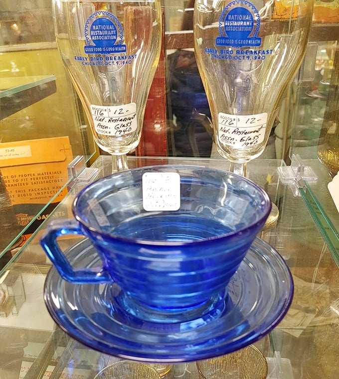 Depression glass in that impossible-to-replicate cobalt blue. Your grandmother would recognize these instantly—and probably wish she'd kept hers.