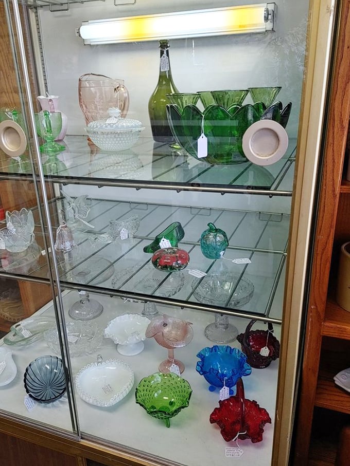 Colorful glassware that transforms ordinary light into jewel-toned magic &ndash; each piece waiting to become someone's "that special thing I found antiquing."