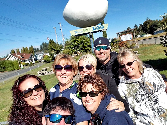 Nothing says "we conquered the World's Largest Egg" quite like a group selfie with friends to commemorate your pilgrimage to poultry paradise.