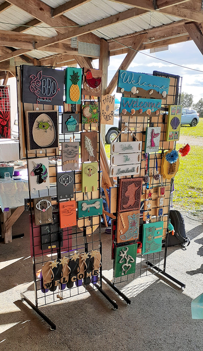 Handcrafted welcome signs and whimsical string art transform this vendor's booth into a Pinterest board come to life &ndash; ready-made personality for any front door or beach house.