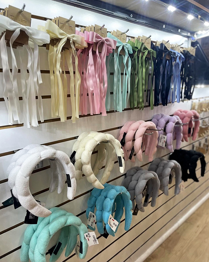 A spectrum of headbands arranged like a pastel rainbow&mdash;proof that even the smallest accessories get the color-coordination treatment here.