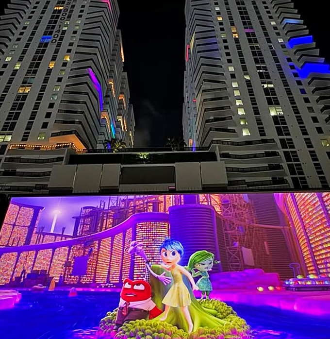 Pixar's emotional characters find the perfect showcase against Miami's colorful nightscape, delighting viewers of all ages under the stars.