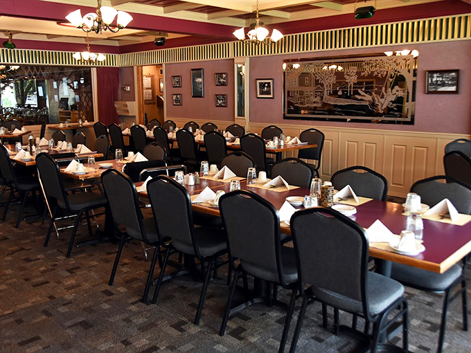 Another view of the dining room reveals careful place settings awaiting the evening's parade of prime rib and fish fry.