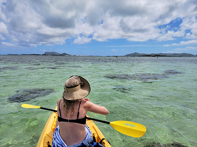 Paddling through paradise with mountains watching approvingly&mdash;kayaking here feels like therapy with better scenery and sunshine.